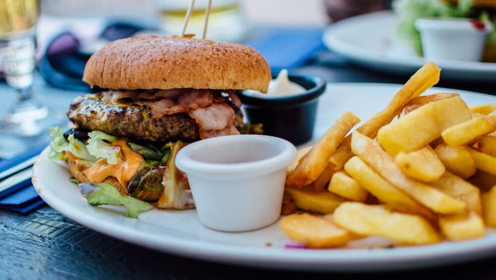 fries and burger on plate